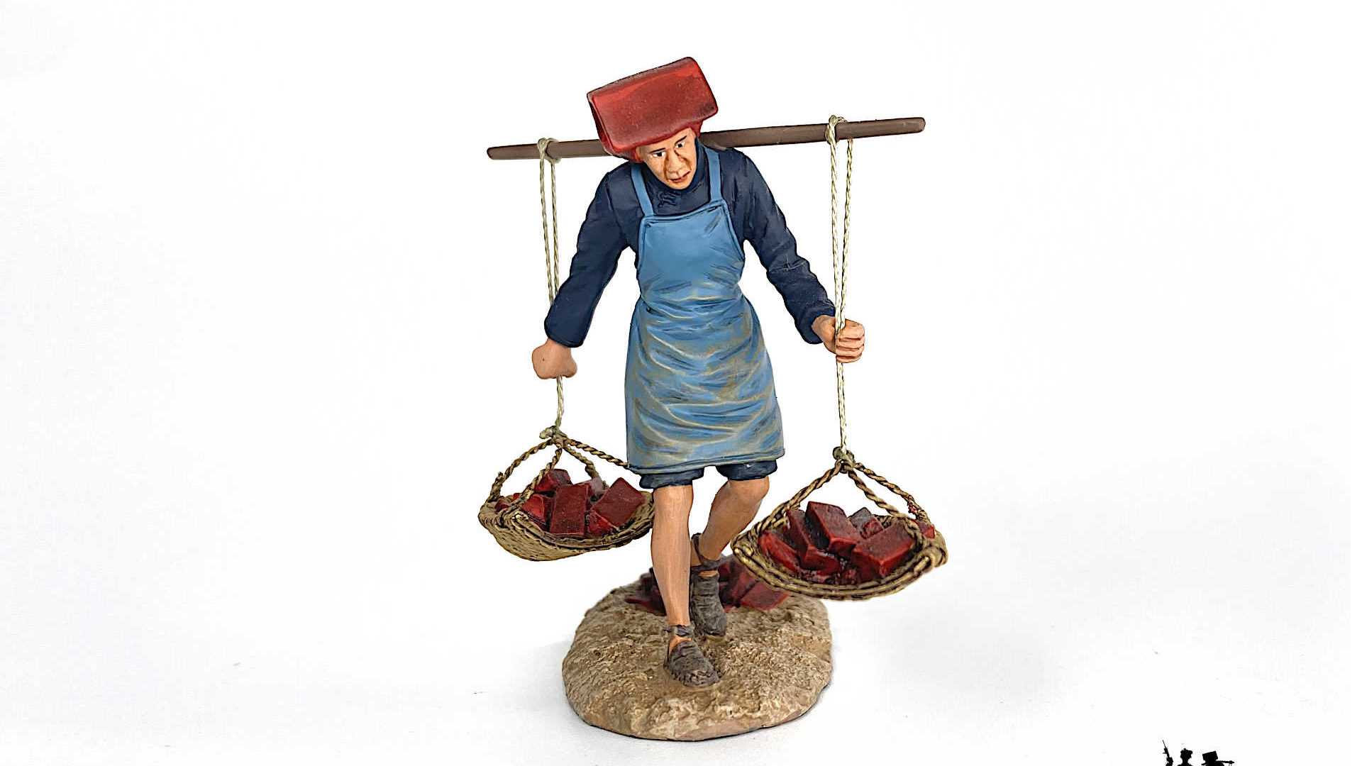 Hand-painted miniature figurine of a Samsui Woman from old Singapore