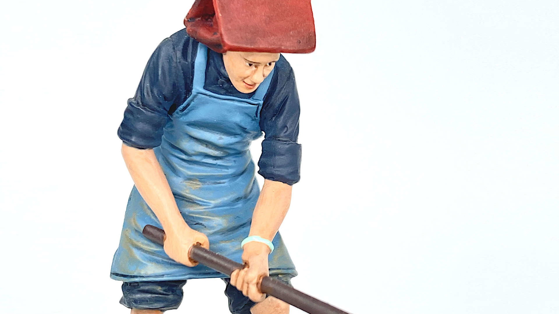 Hand-painted miniature figurine of a Samsui Woman from old Singapore