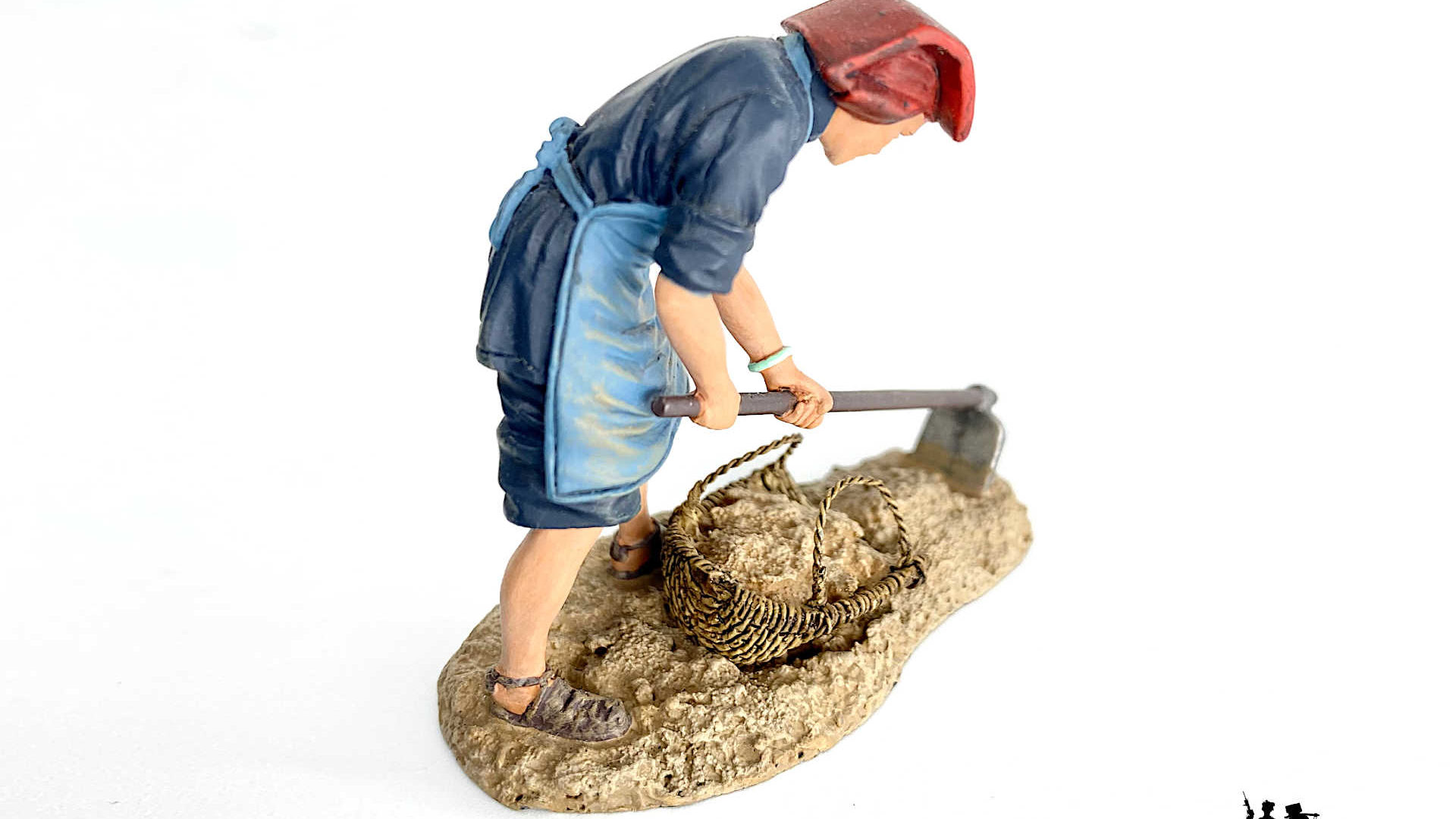 Hand-painted miniature figurine of a Samsui Woman from old Singapore