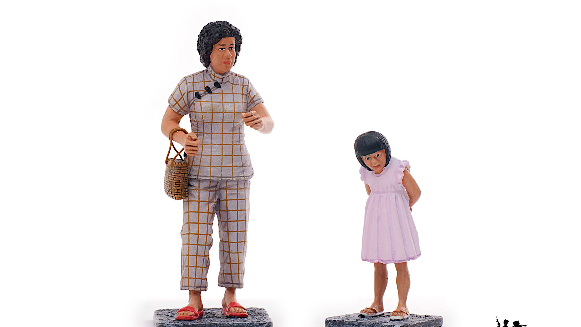 Miniature figurine of a Chinese woman in samfu from old Singapore