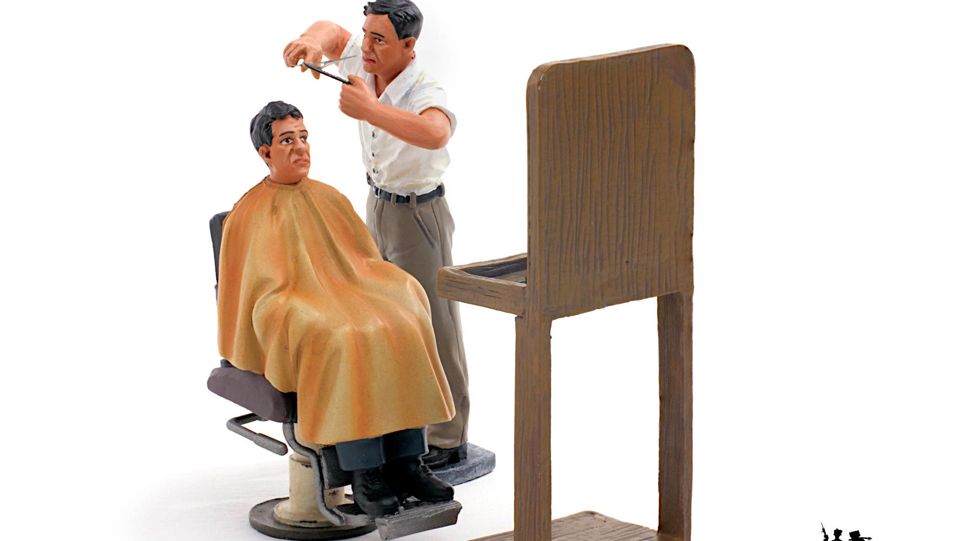 Hand-painted miniature figurine of a street barber from old Singapore