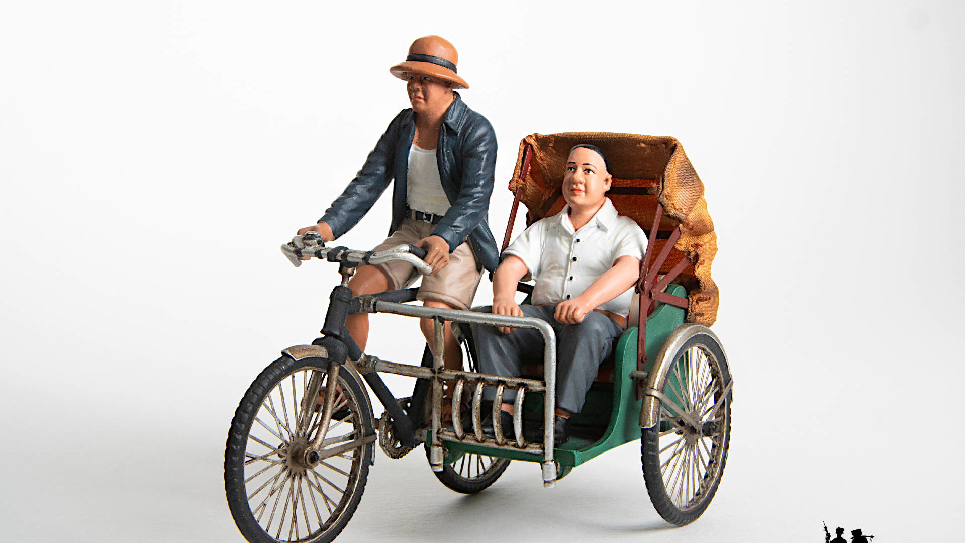 Hand-painted miniature figurine of a trishaw rider from 1950s Singapore