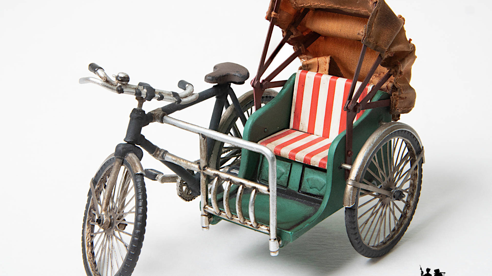 Hand-painted miniature figurine of a trishaw rider from 1950s Singapore