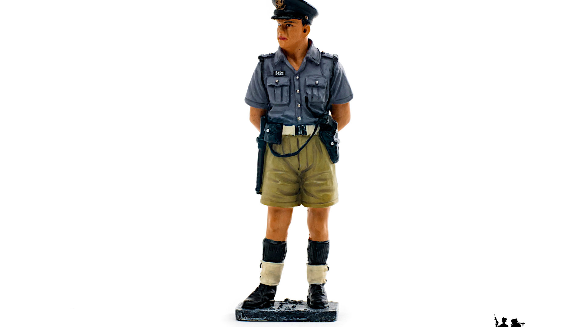 Miniature 1950s police officer figurine from Singapore