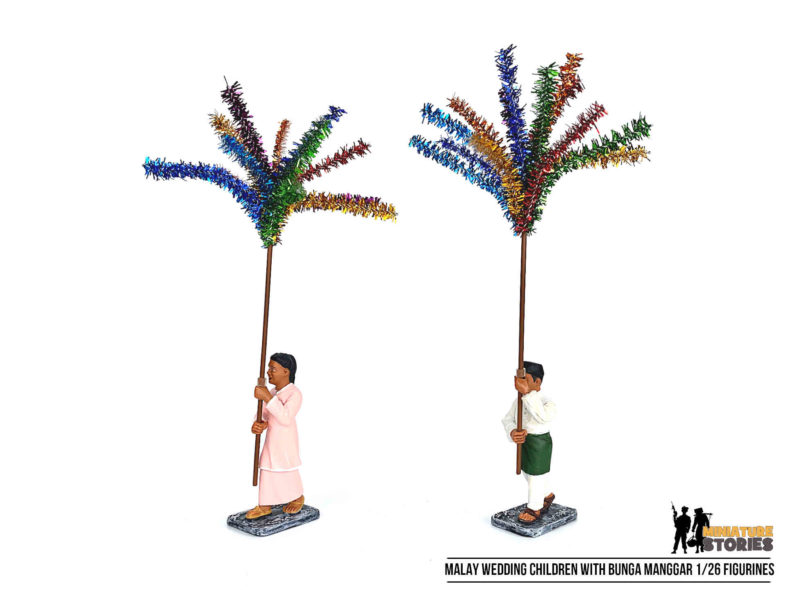 Hand-painted miniature metal figurines of children carrying bunga manggar